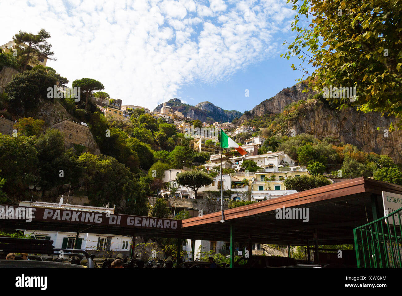 Positano, Italy, September 16 2017. An Italian flag flies in the breeze ...