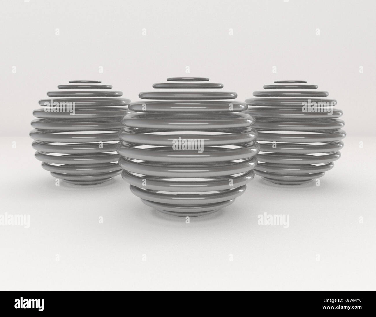 multiple spheres with metallic rings on a white background Stock Photo ...