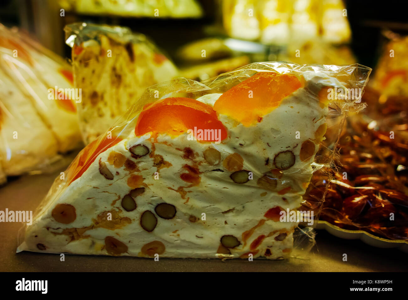 Fresh colorful dessert - traditional nougat with nuts and fruits in ...