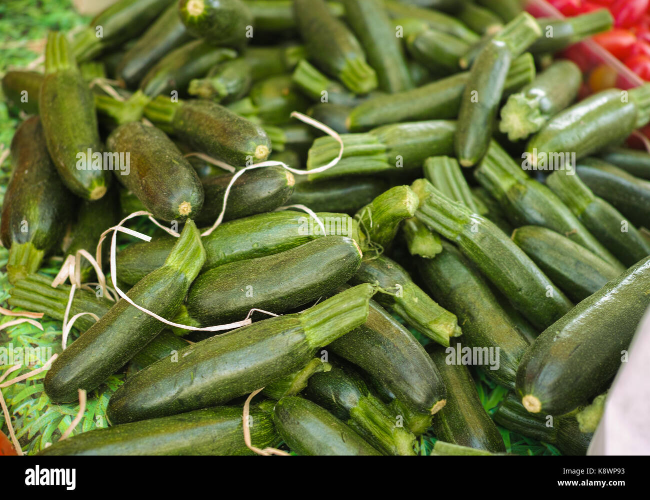 Fresh small green mini courgette, healthy food Stock Photo - Alamy