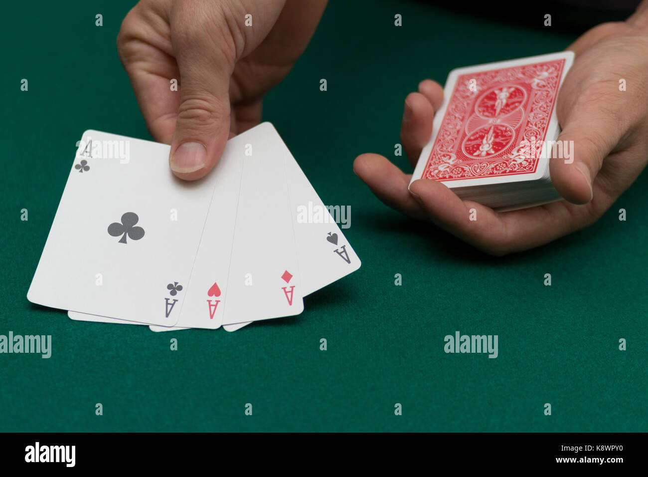 Hands holding cards hi-res stock photography and images - Alamy