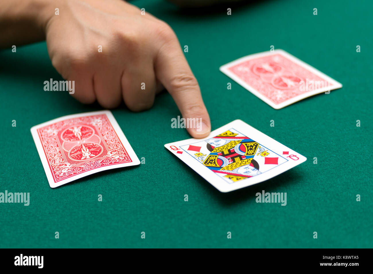 Person holding playing cards hi-res stock photography and images - Alamy