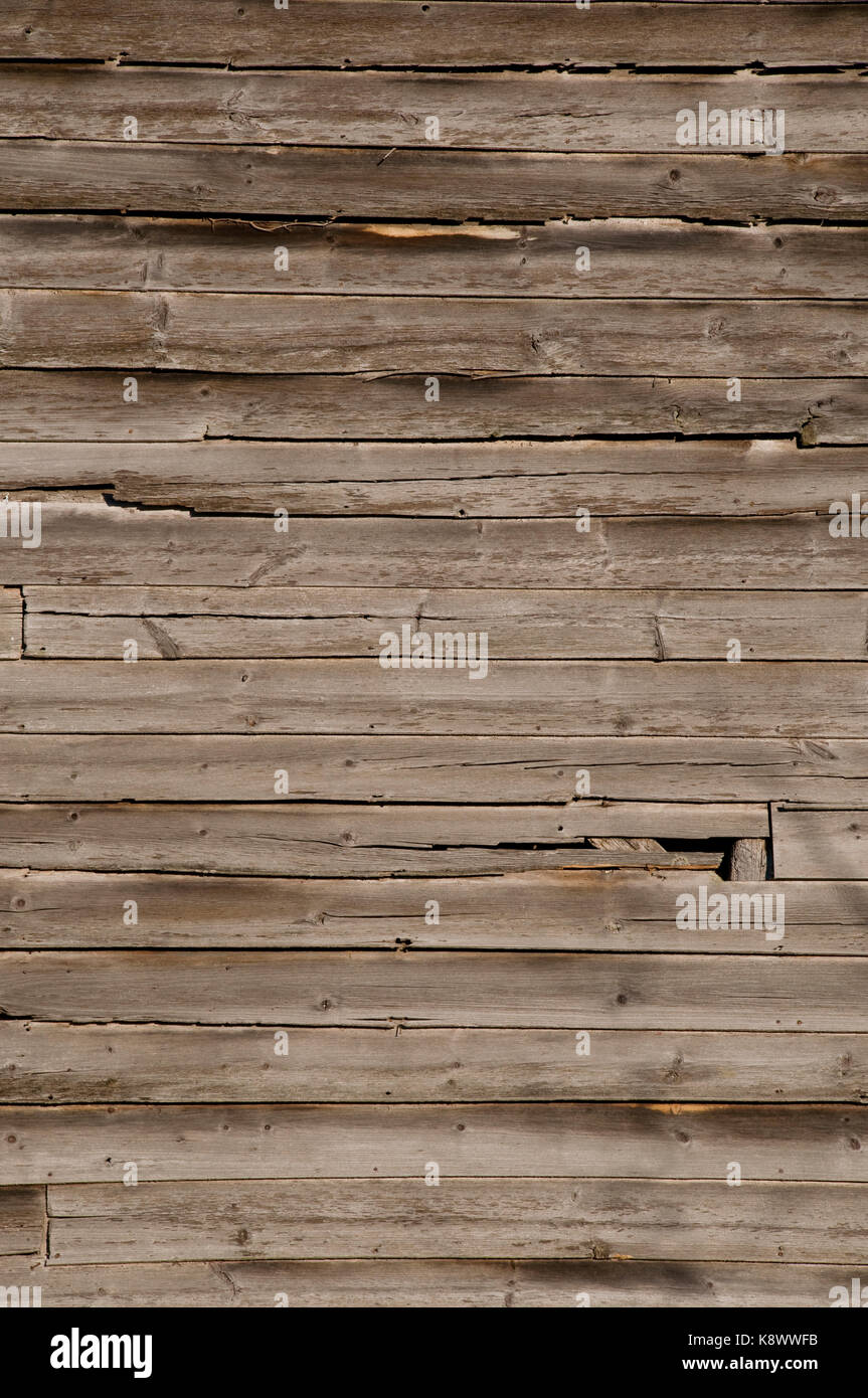 Exterior weathered wooden wall with unpainted planks Stock Photo - Alamy