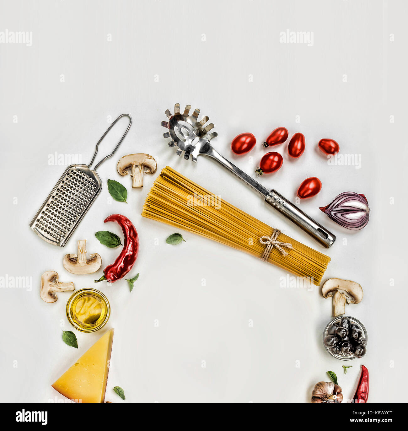 Flat lay. Fettuccine and spaghetti with ingredients for cooking pasta ...