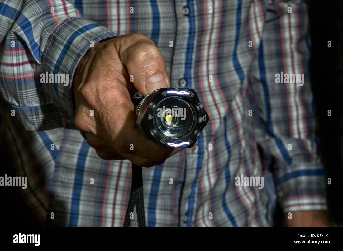 A person uses an electric shock for personal protection Stock Photo - Alamy