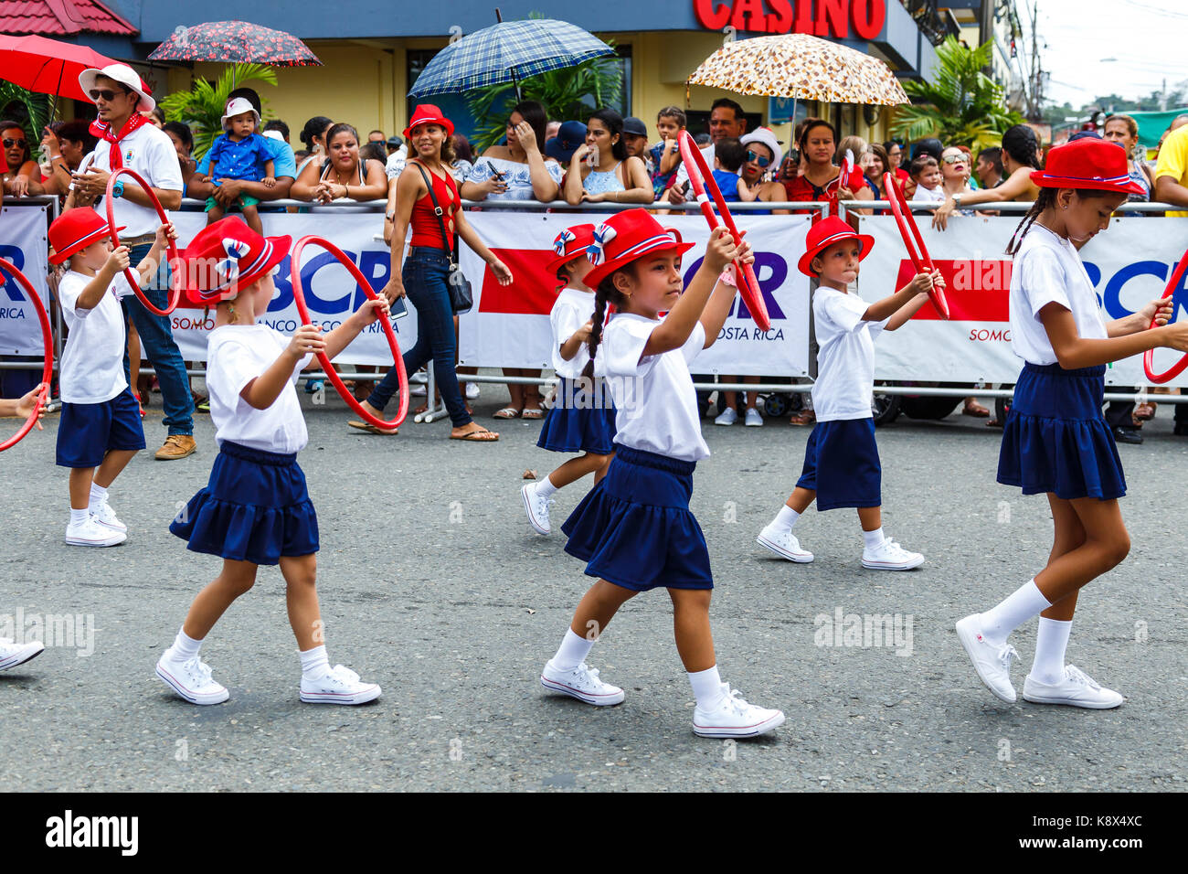 Group of girls with hula hoops marching in the 2017 Independence Day ...
