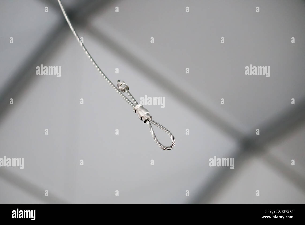 Cables and hook hanging from the Ceiling at the Construction site Stock ...