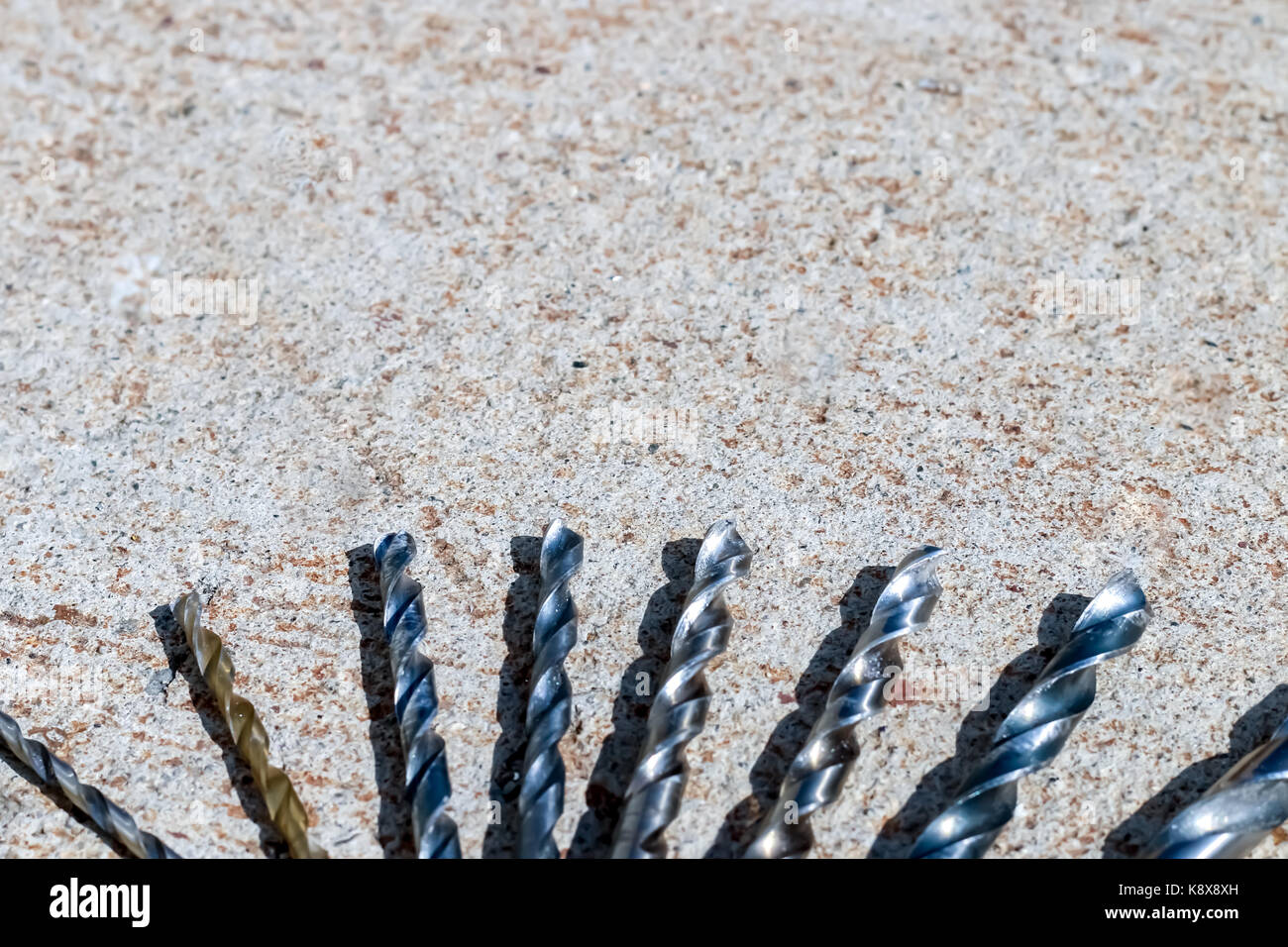 The Isolated Drill Bits with the Gray Ground Background Stock Photo - Alamy