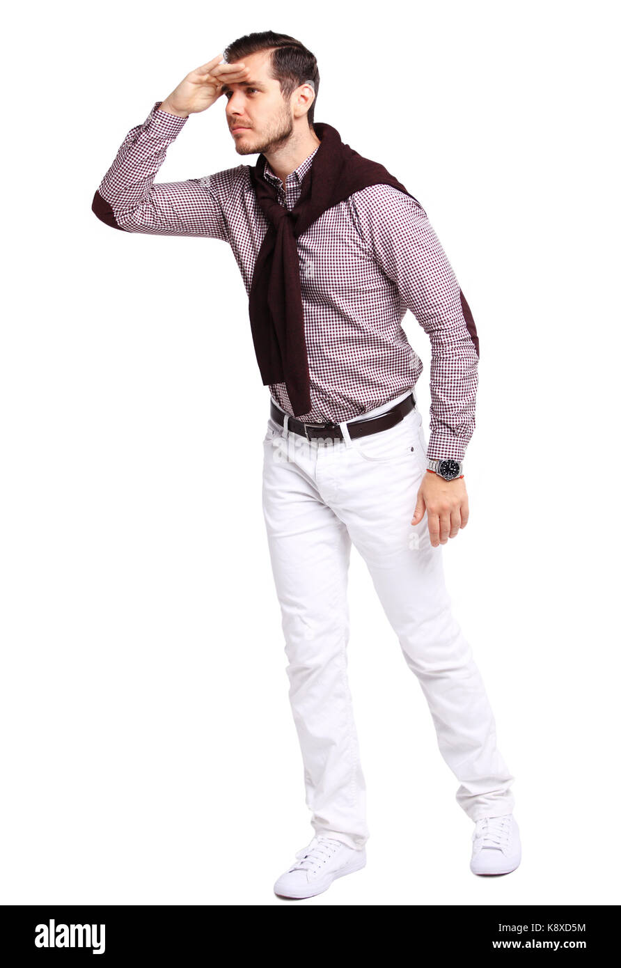 elegant people looking for something on white Stock Photo - Alamy