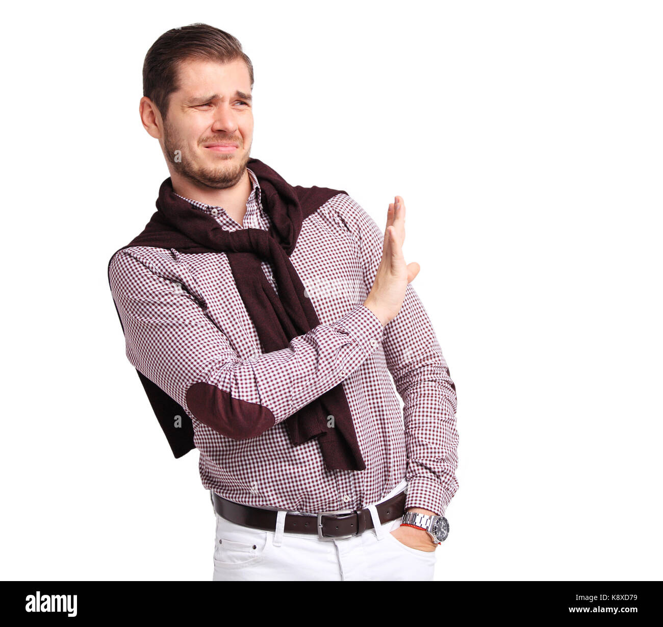 Happy smiling young man presenting and showing your text or product ...