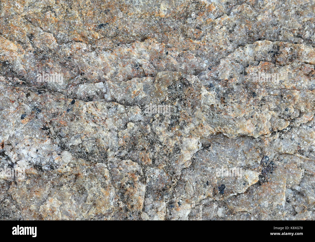 Grey and reddish granite, closeup view with multiple rock faces Stock ...