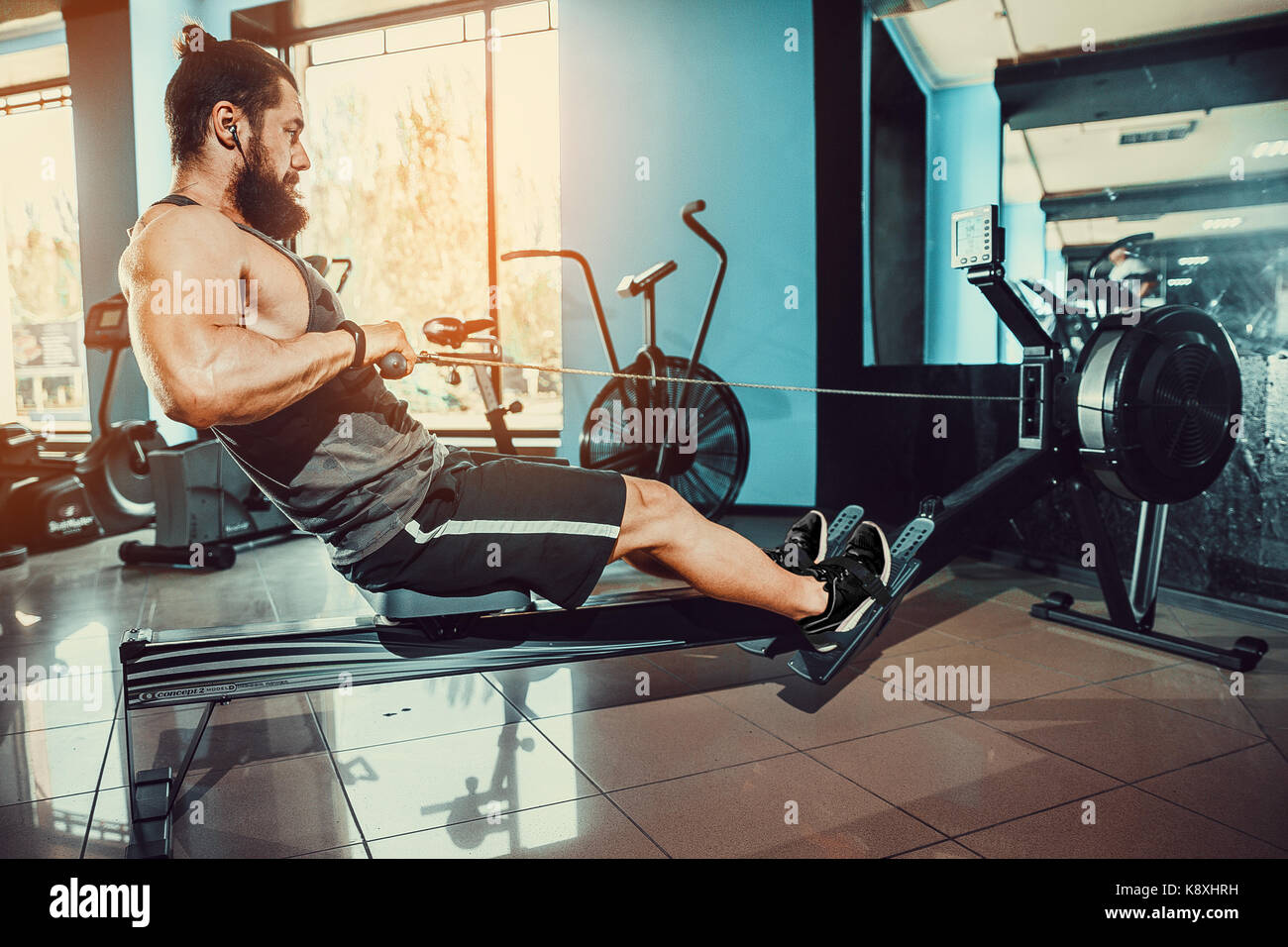 Young guy training using machine hi-res stock photography and images ...