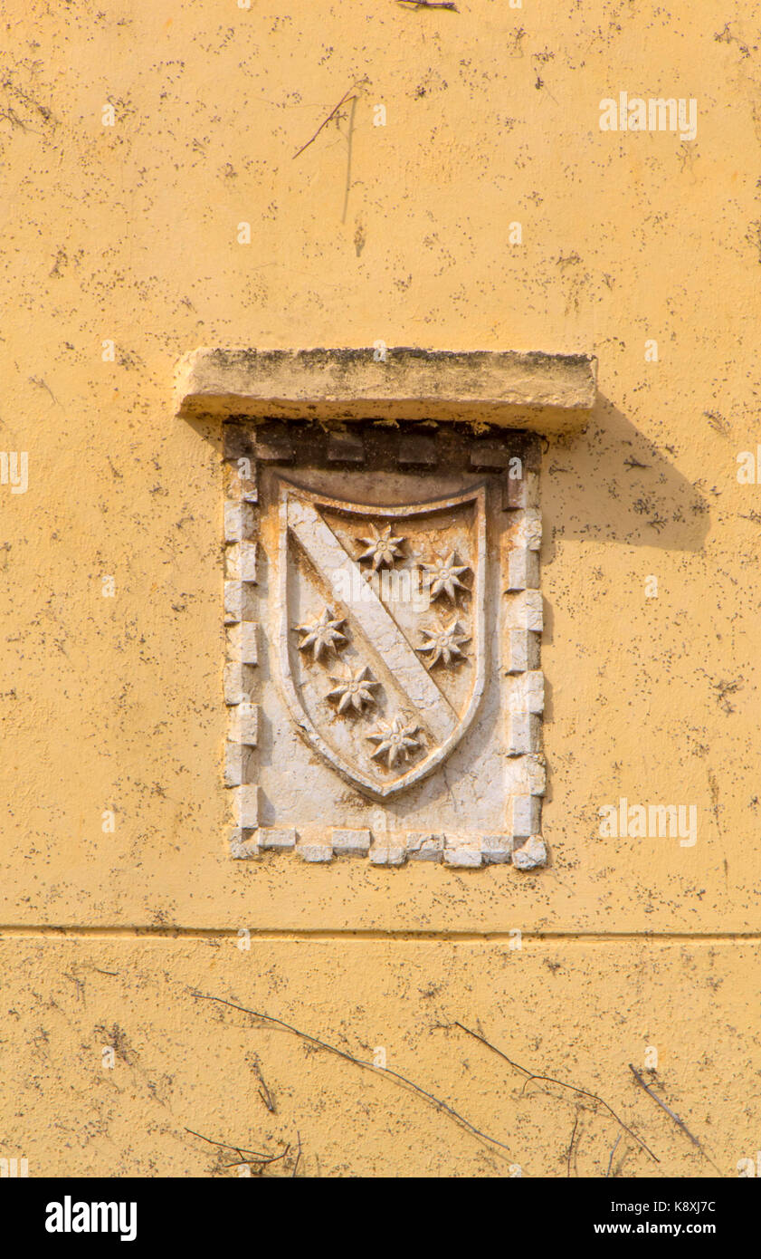 Close-up of coat of arms carved in stone in a wall Stock Photo - Alamy