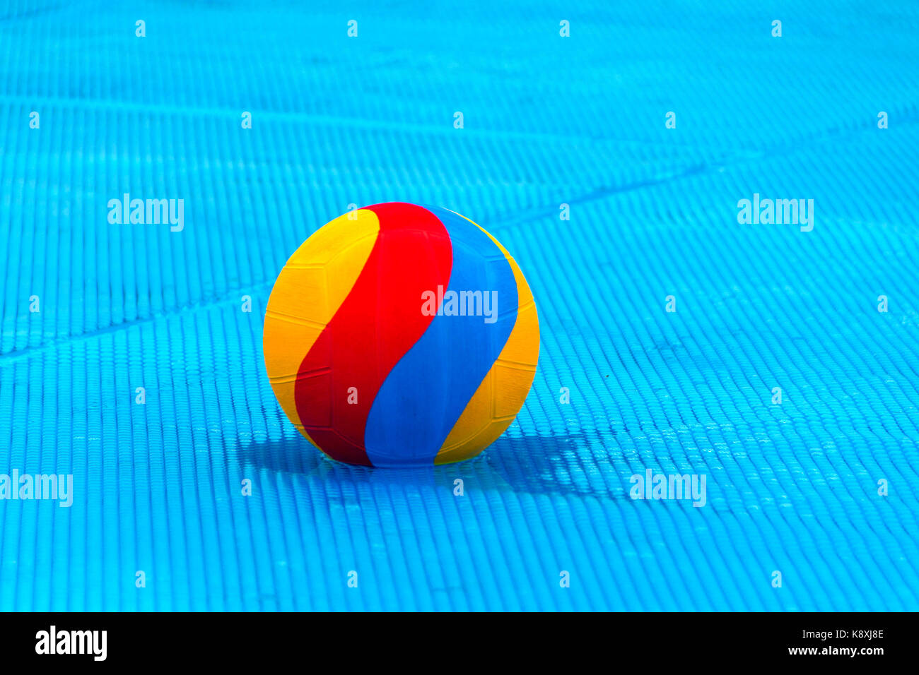 A water polo ball floating on the water in a pool during the game Stock ...