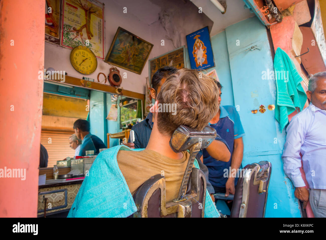 Jaipur, India - September 20, 2017: Barber shaving a man using an open ...