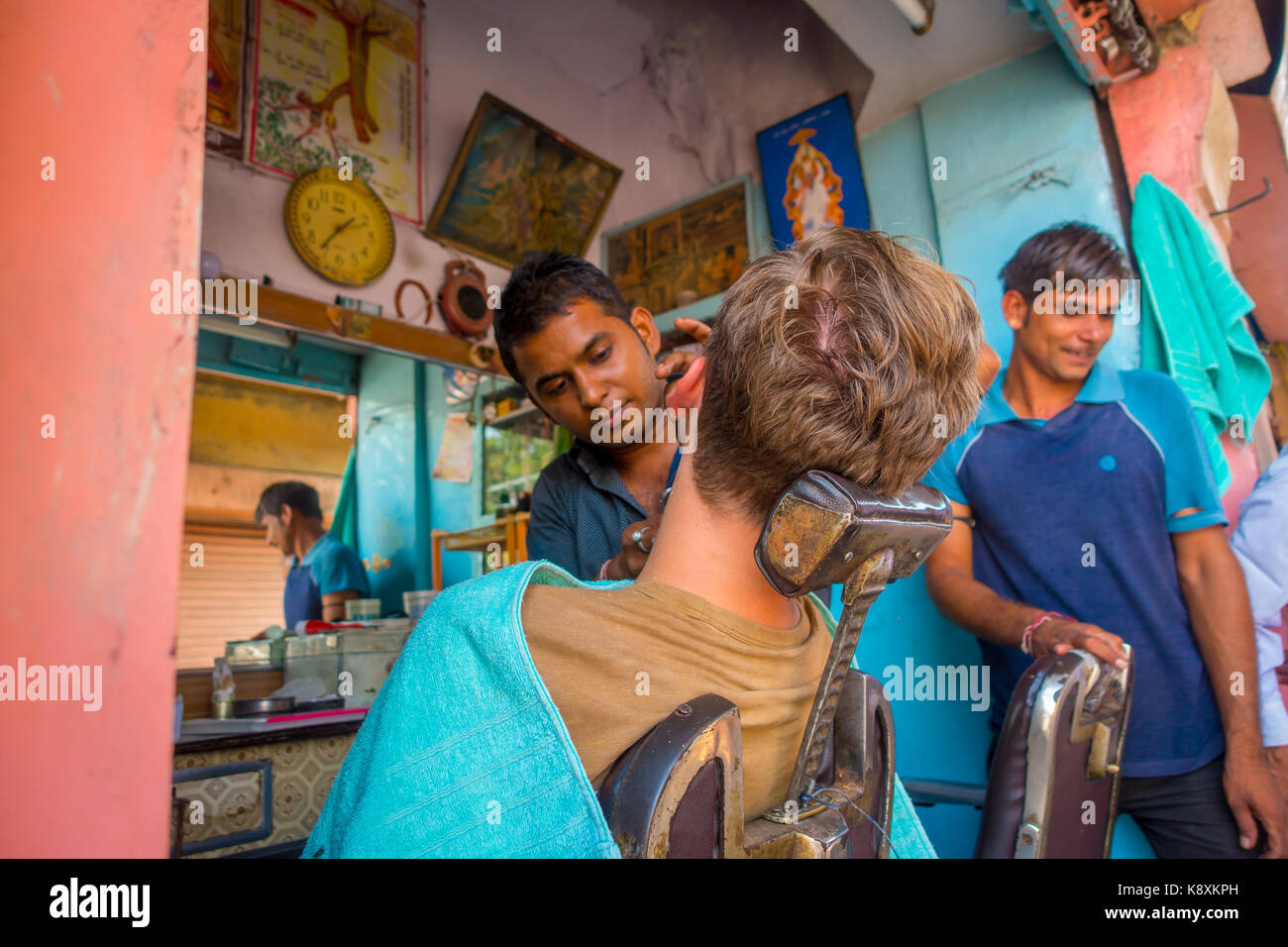 Jaipur, India - September 20, 2017: Barber shaving a man using an open ...