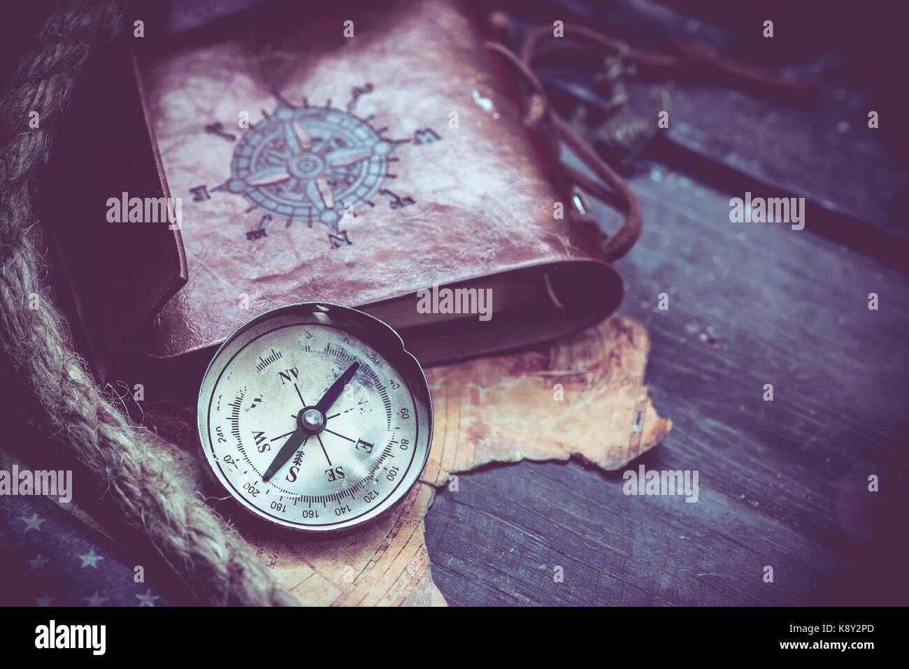 Columbus day and world map with compass Stock Photo - Alamy