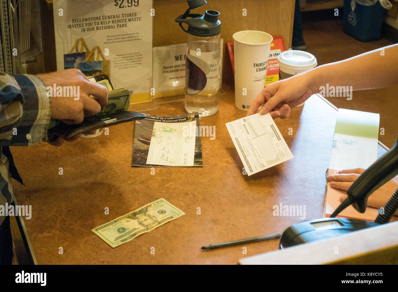 Handing money purchase hi-res stock photography and images - Alamy