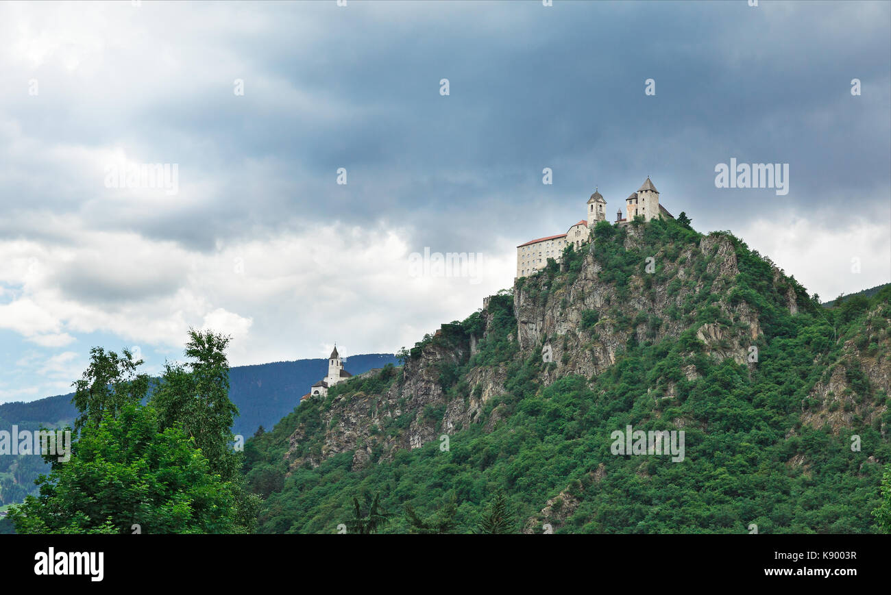 Medieval castle on mountain background hi-res stock photography and ...