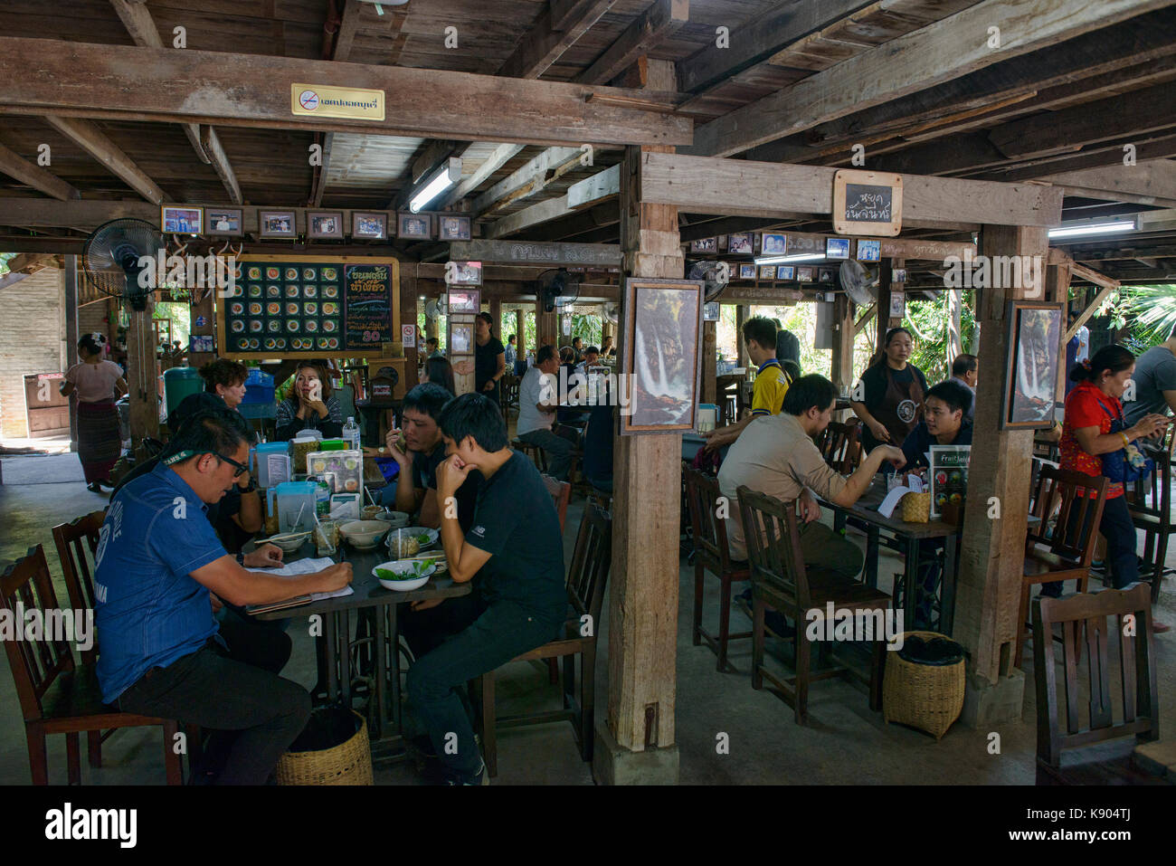 Enjoying traditional northern food in Chiang Mai, Thailand Stock Photo ...