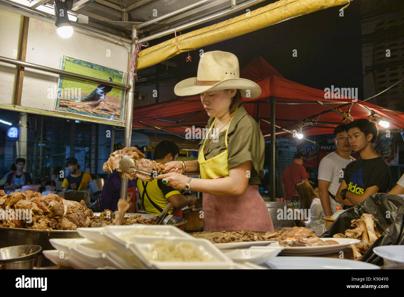The famous Khao Ka Moo Cowboy pork knuckle cook in Chiang Mai, Thailand ...