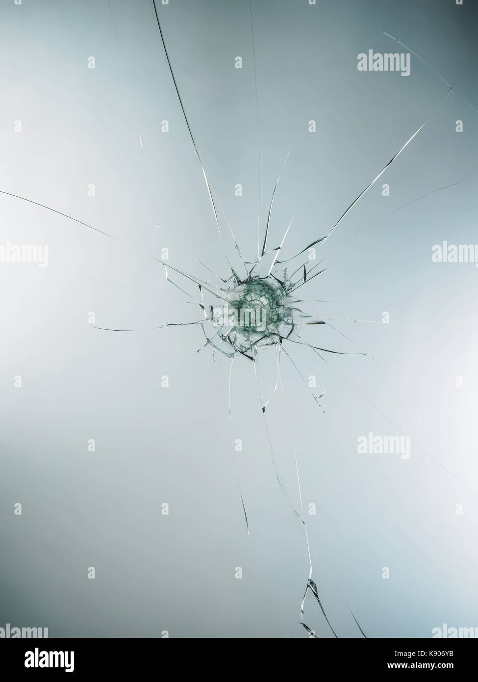 broken cracked glass with hole over white background Stock Photo - Alamy