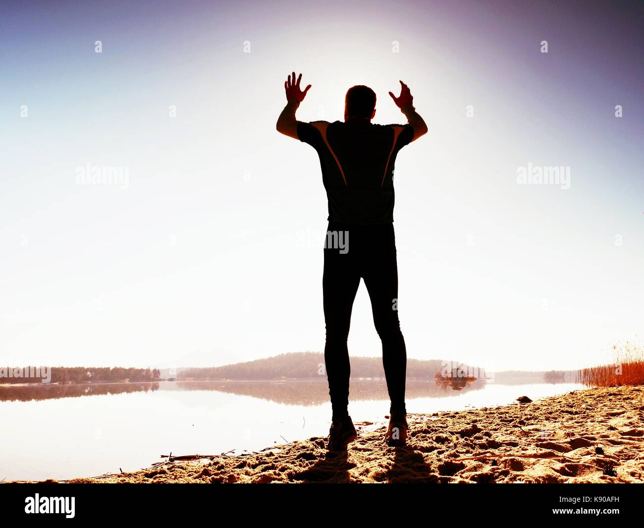 Man crazy jumping on beach. Sportsman flying on beach during the ...