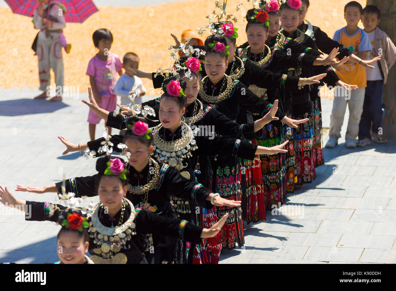 Xijiang, China - September 15, 2007: Line of Miao women dance wearing ...