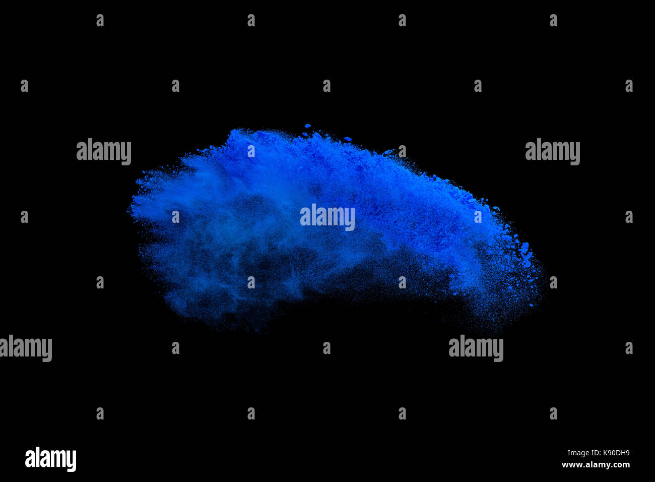 Powder explosion. Closeup of blue dust particle explosion isolated on ...