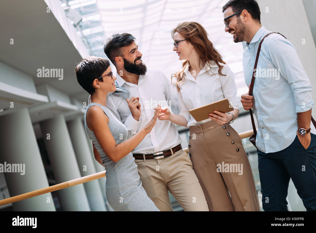 Group young people talking together hi-res stock photography and images ...