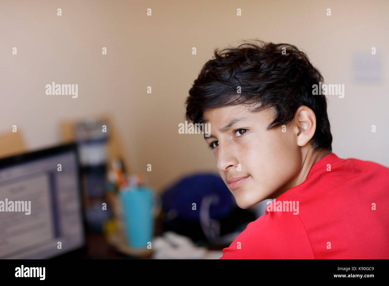 Hispanic teen work home hi-res stock photography and images - Alamy