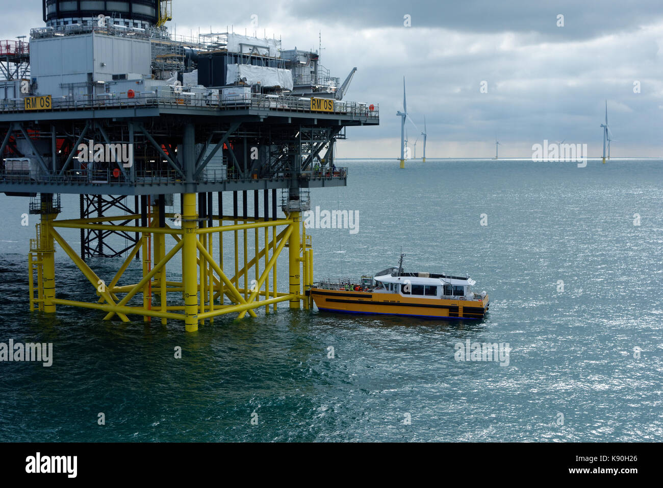 A Crew Transfer Vessel (CTV) alongside the Rampion Offshore Windfarm ...