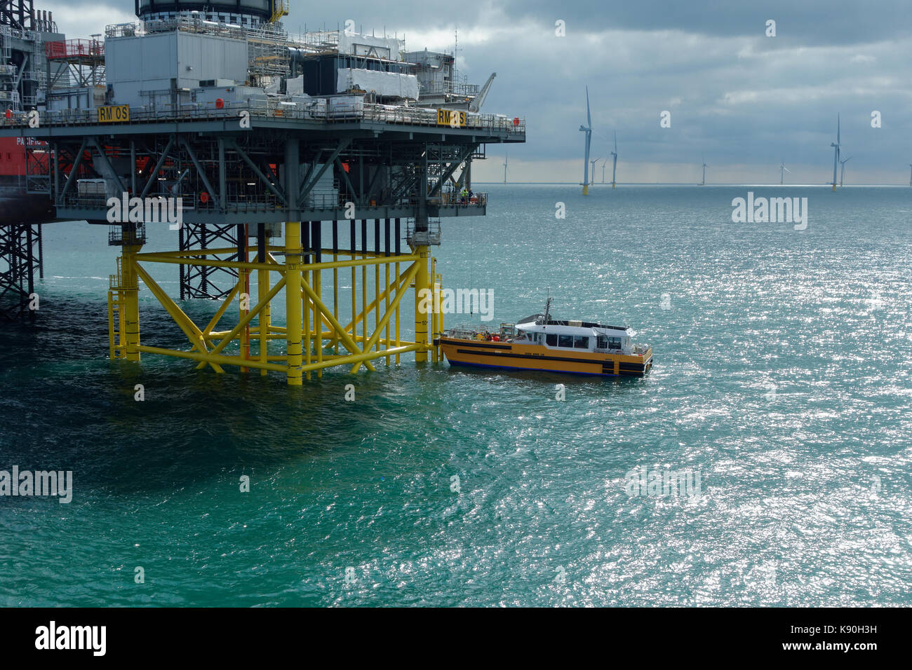 A Crew Transfer Vessel (CTV) alongside the Rampion Offshore Windfarm ...