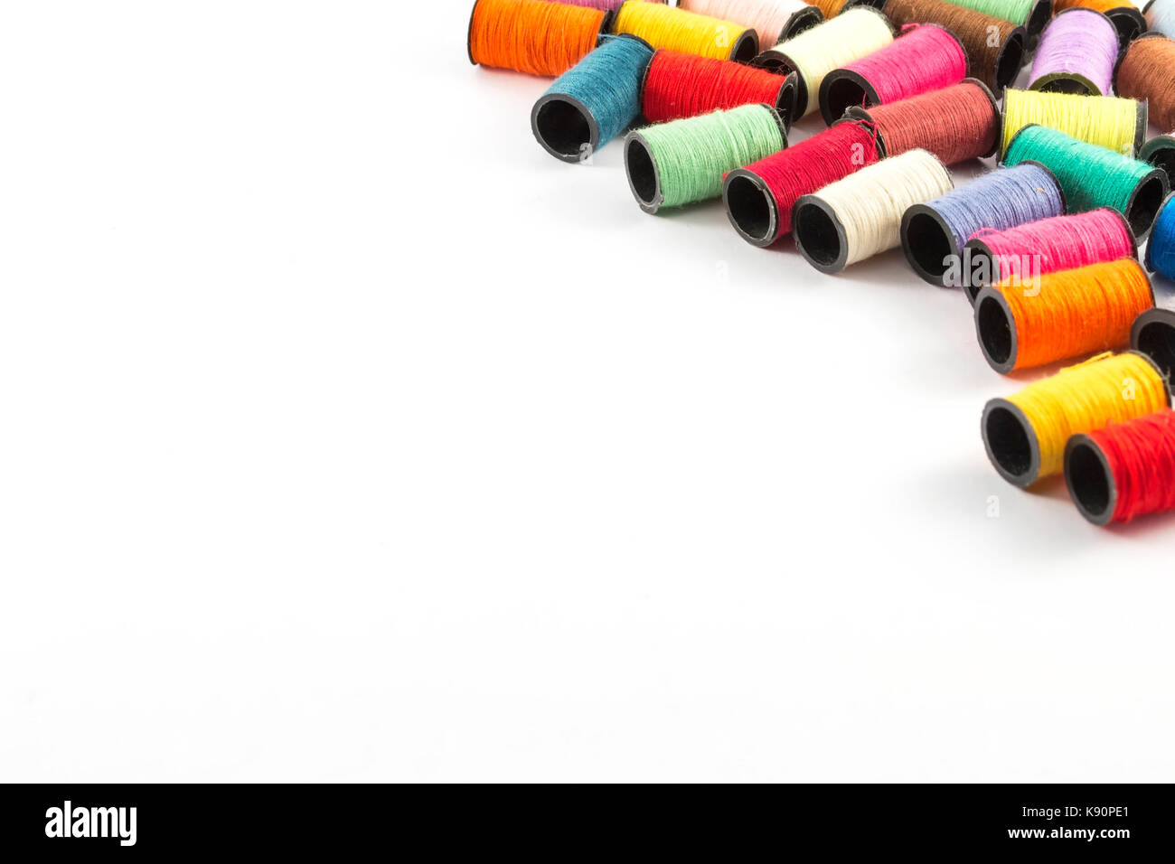 Sewing Threads on white background Stock Photo - Alamy