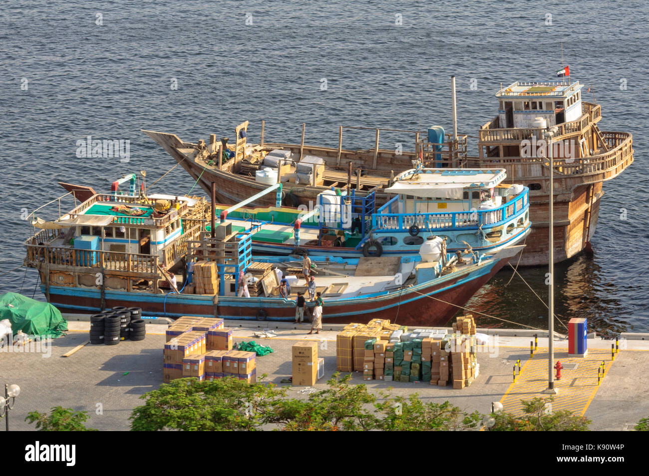 Wooden dhow cargo boats loaded with merchandise on Dubai Creek - United ...