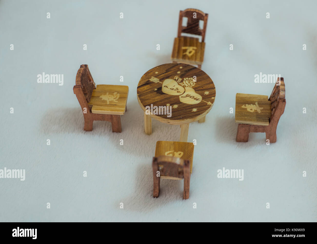 Miniature wooden table and chairs Stock Photo - Alamy