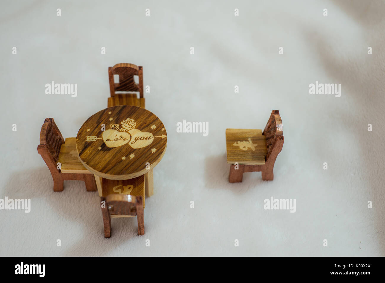 Miniature wooden table and chairs Stock Photo - Alamy