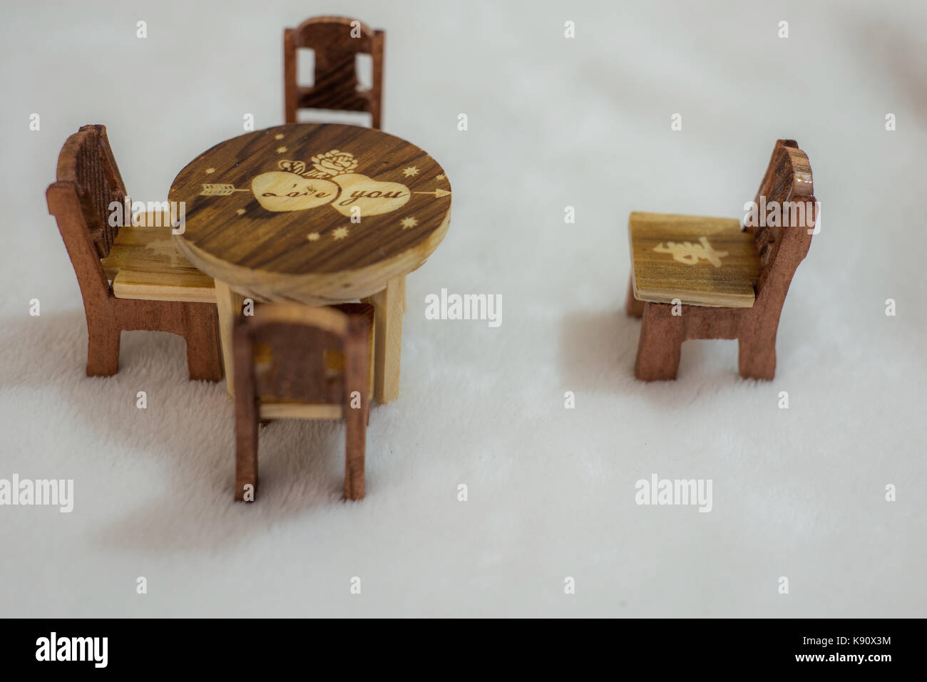 Wooden Miniature table and chairs in a white background Stock Photo - Alamy