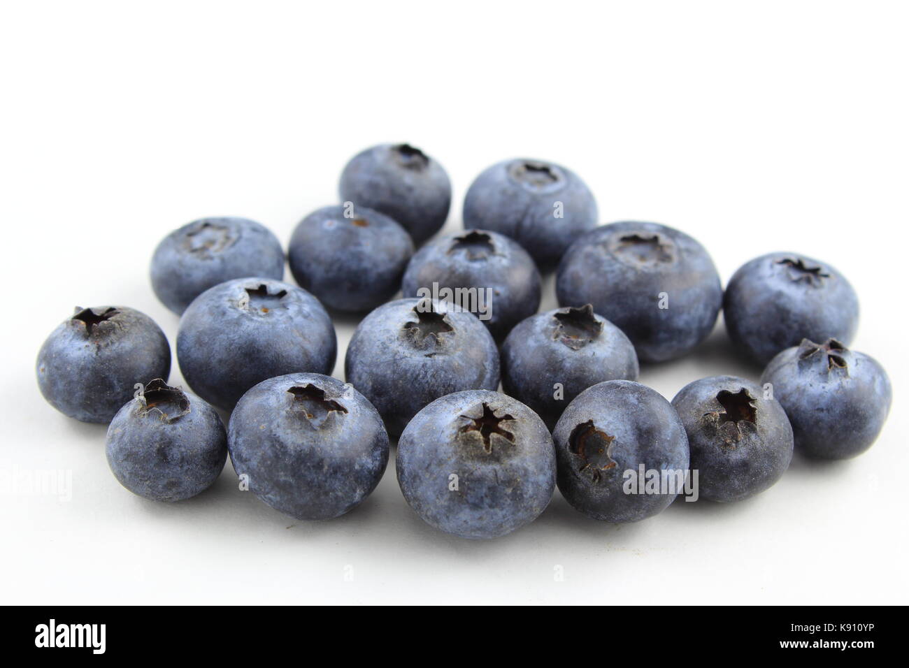 composition of fresh blueberry fruits isolated on a white background ...
