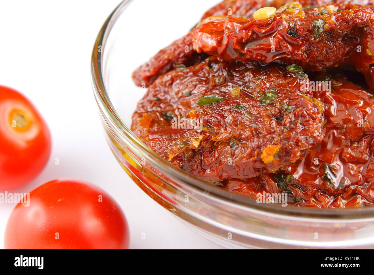 composition of dried tomatoes in olive oil Stock Photo - Alamy