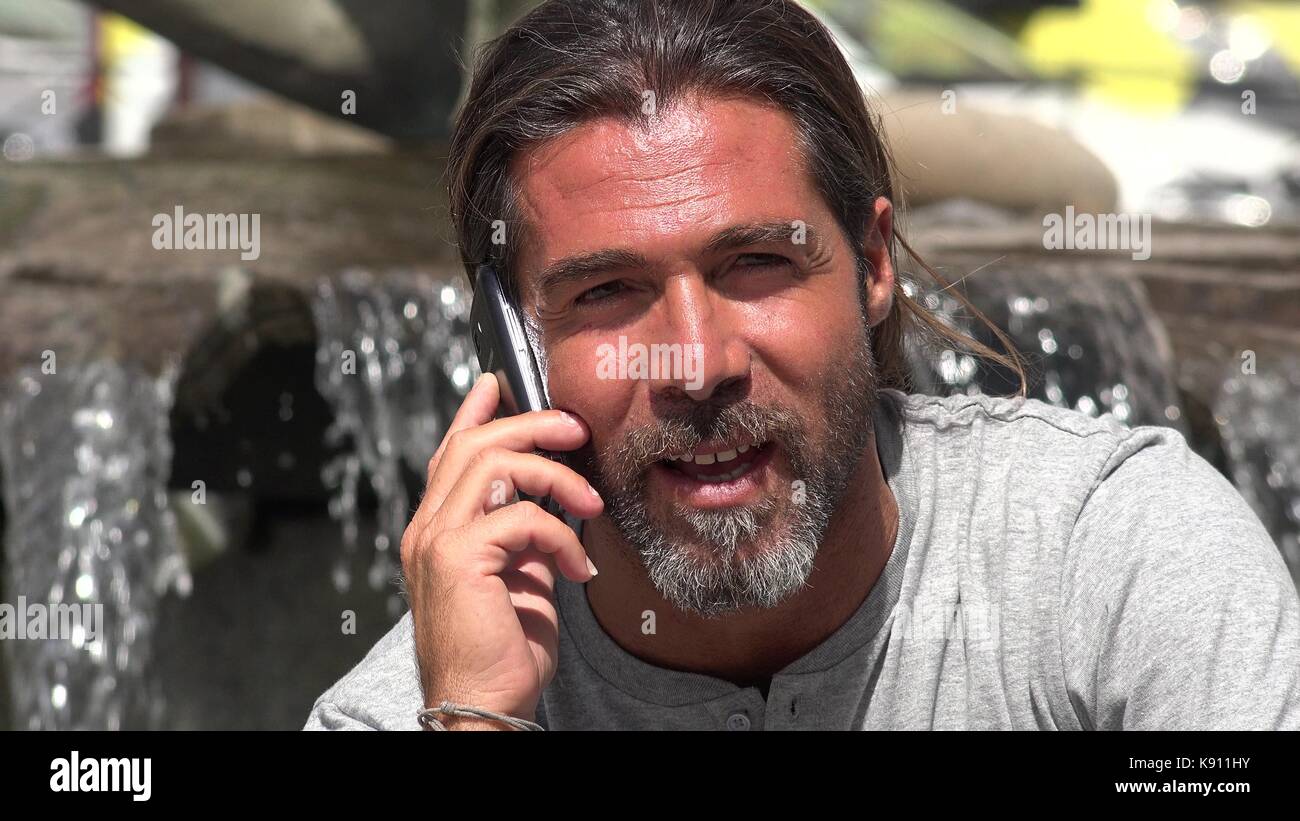 Handsome guy talk hi-res stock photography and images - Alamy