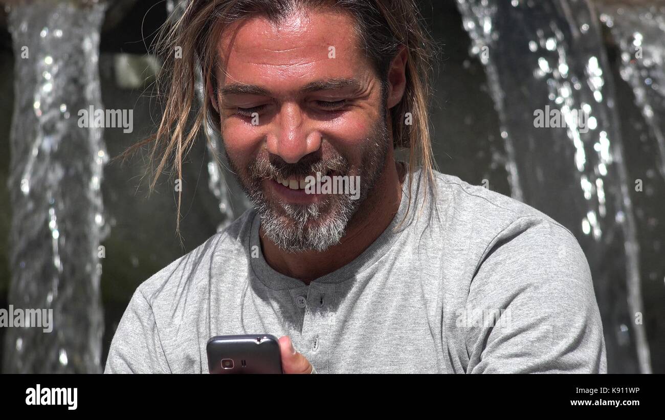 European Male Talking On Phone Stock Photo - Alamy