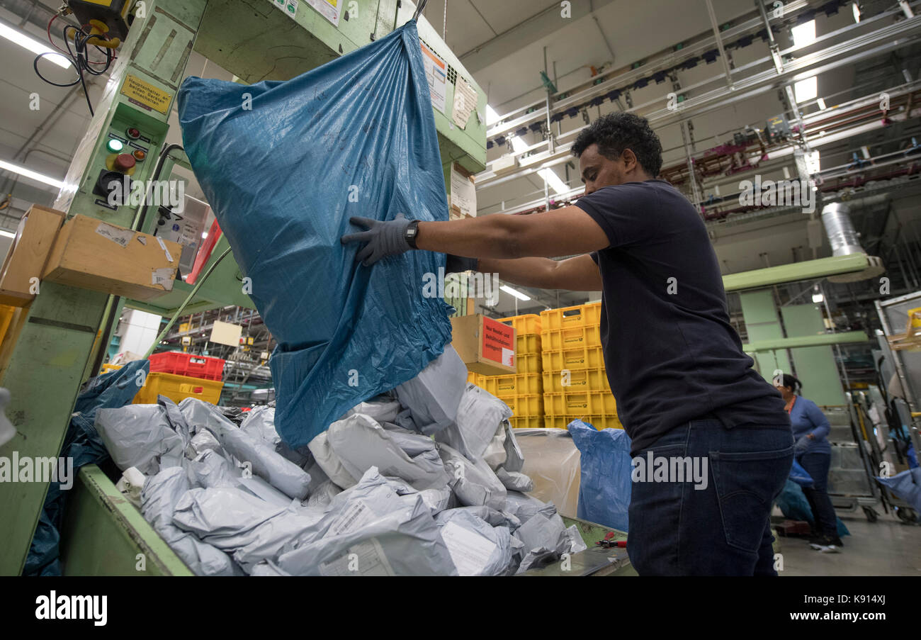 Post Office Workers Sort International Mail In The Post Office In The post-office-workers-sort-international-mail-in-the-post-office-in-the