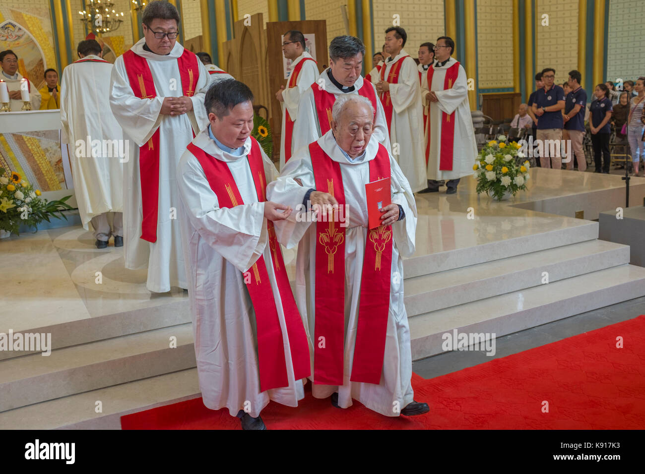 Beijing, China. 21st Sep, 2017. Chinese clergies attend a mass to ...
