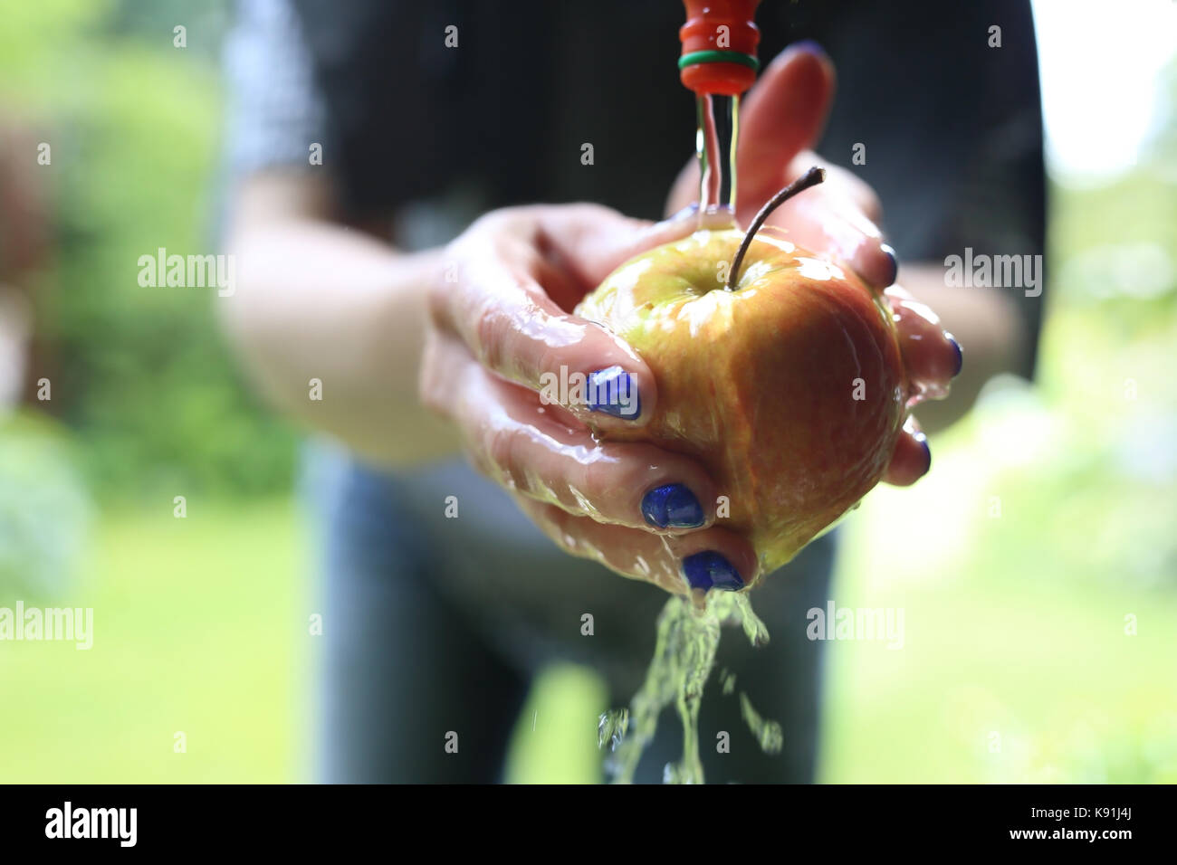 Washing fruit hi-res stock photography and images - Alamy