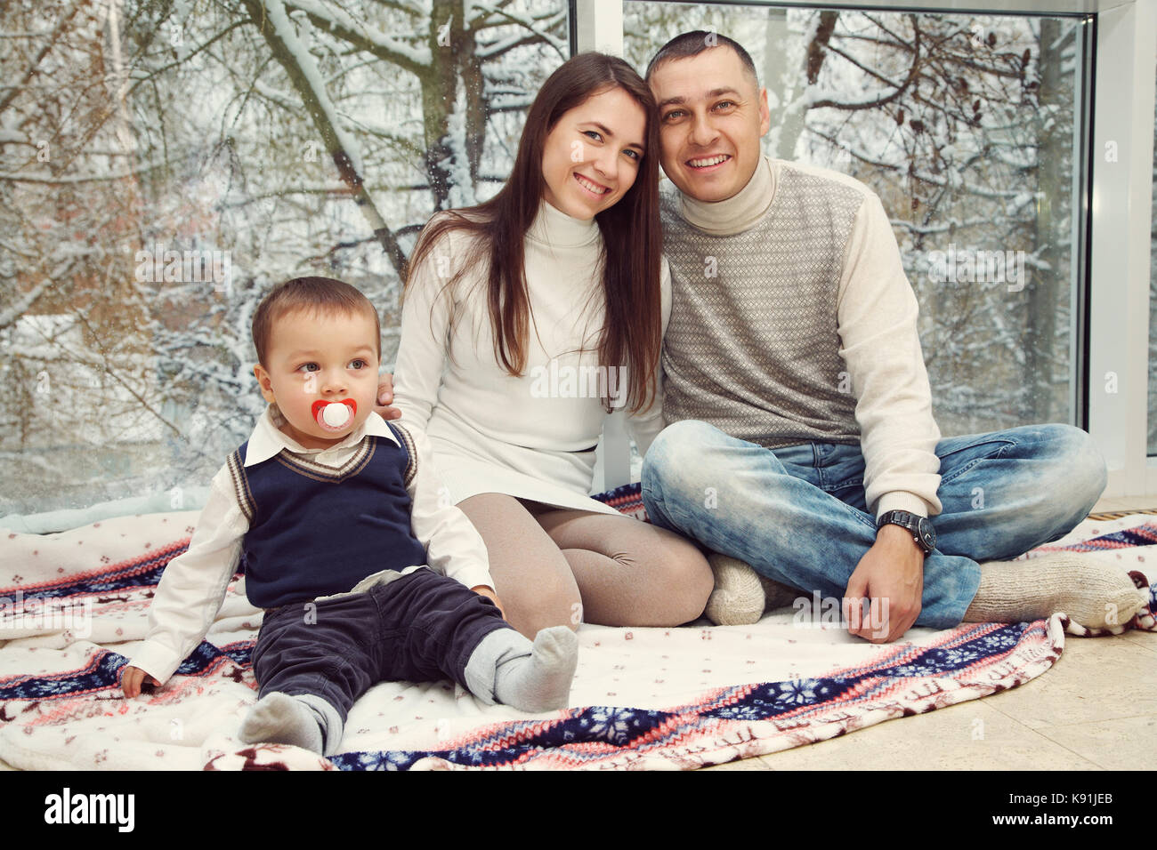 family portrait at home. happy dad, mom and son Stock Photo - Alamy