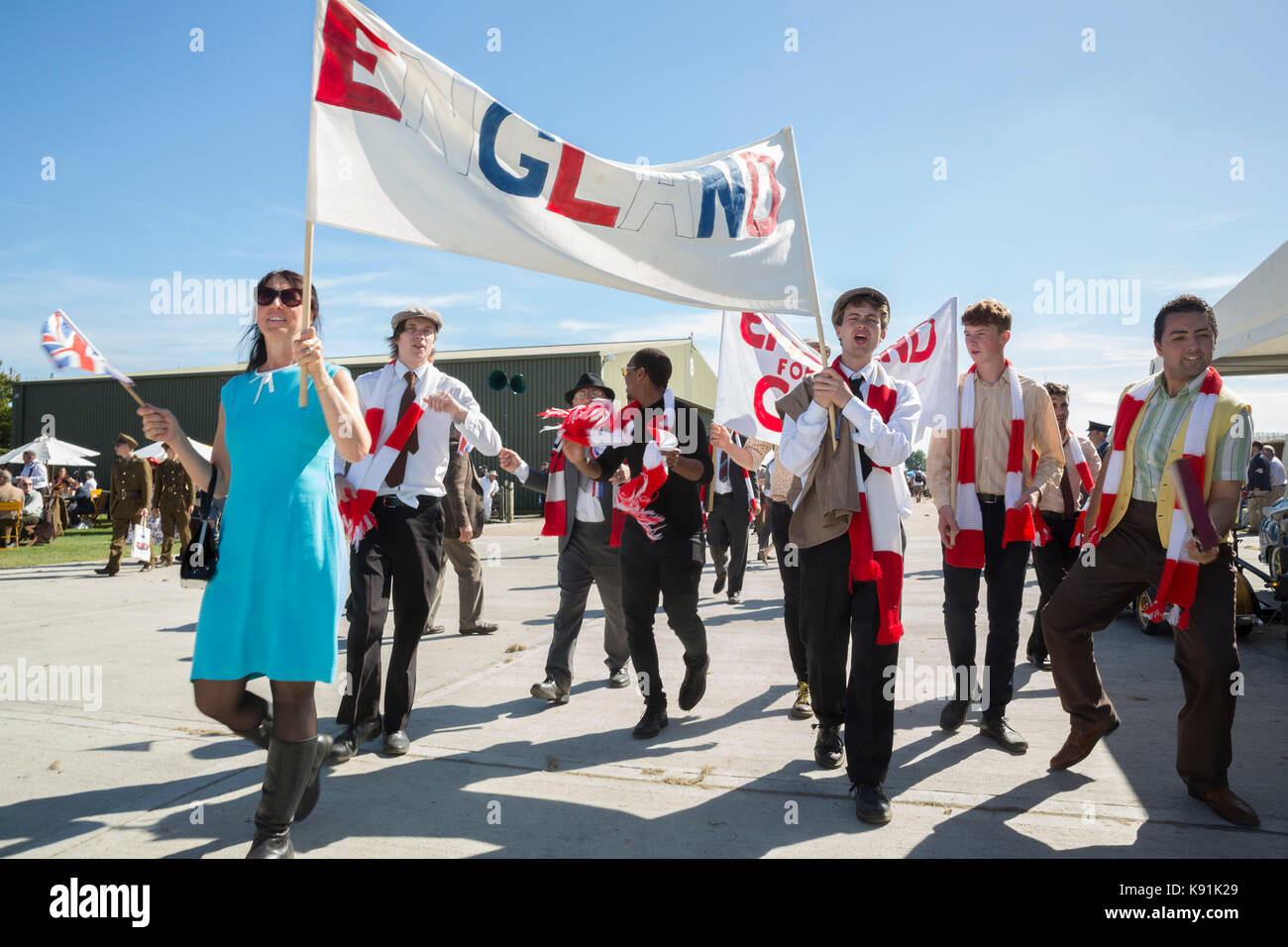 Young England fans in vintage 1960a dress Stock Photo - Alamy