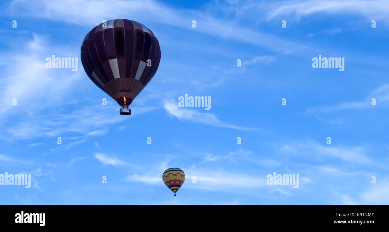 Colorful hot air baloons flying Stock Photo - Alamy