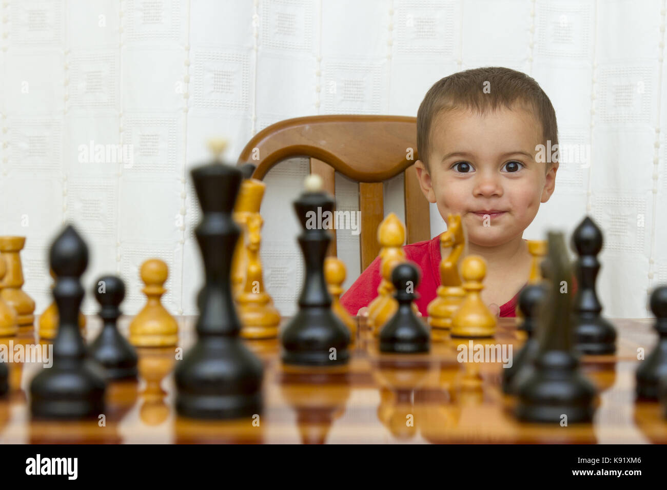little boy plays chess Stock Photo - Alamy