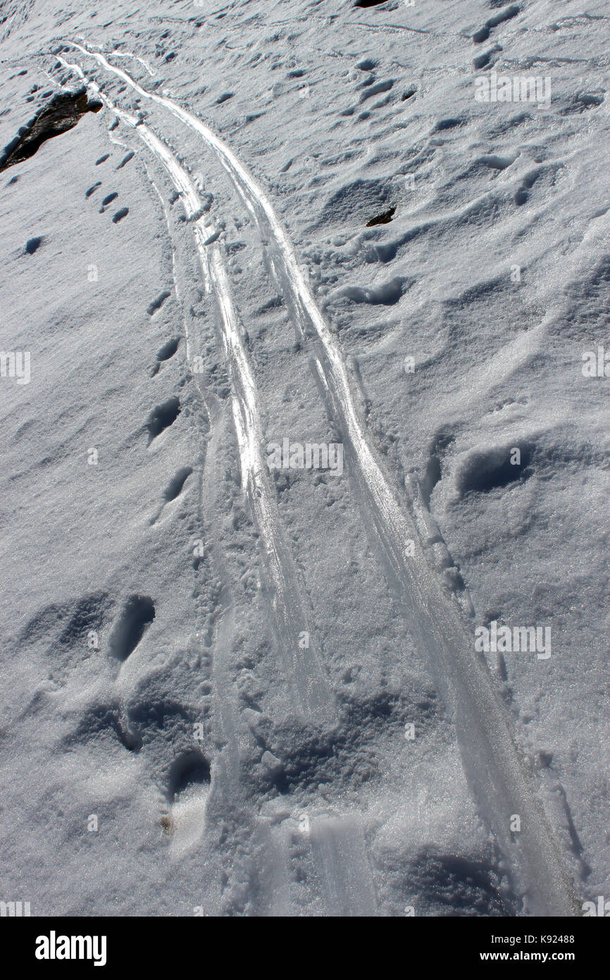 Winter Landscape. Slage Car track on snow Stock Photo - Alamy